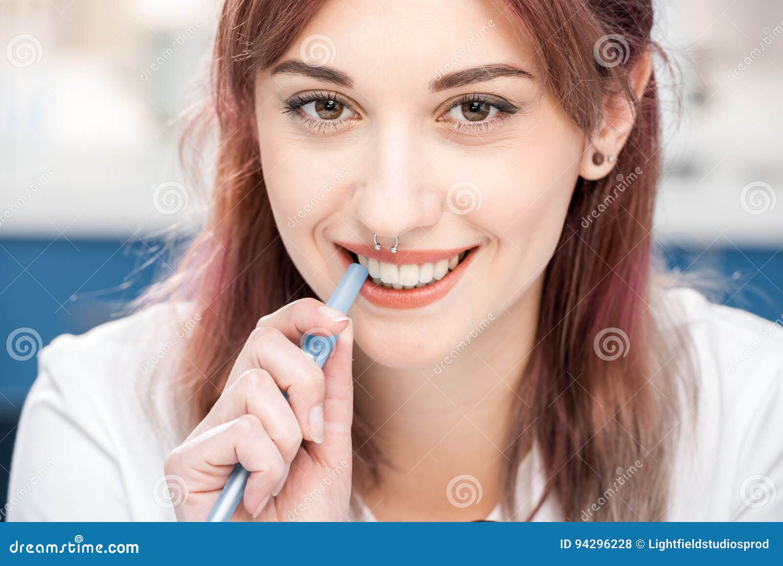 Scientist in Lab Coat with Pen Looking at Camera in Chemical Lab Stock ...