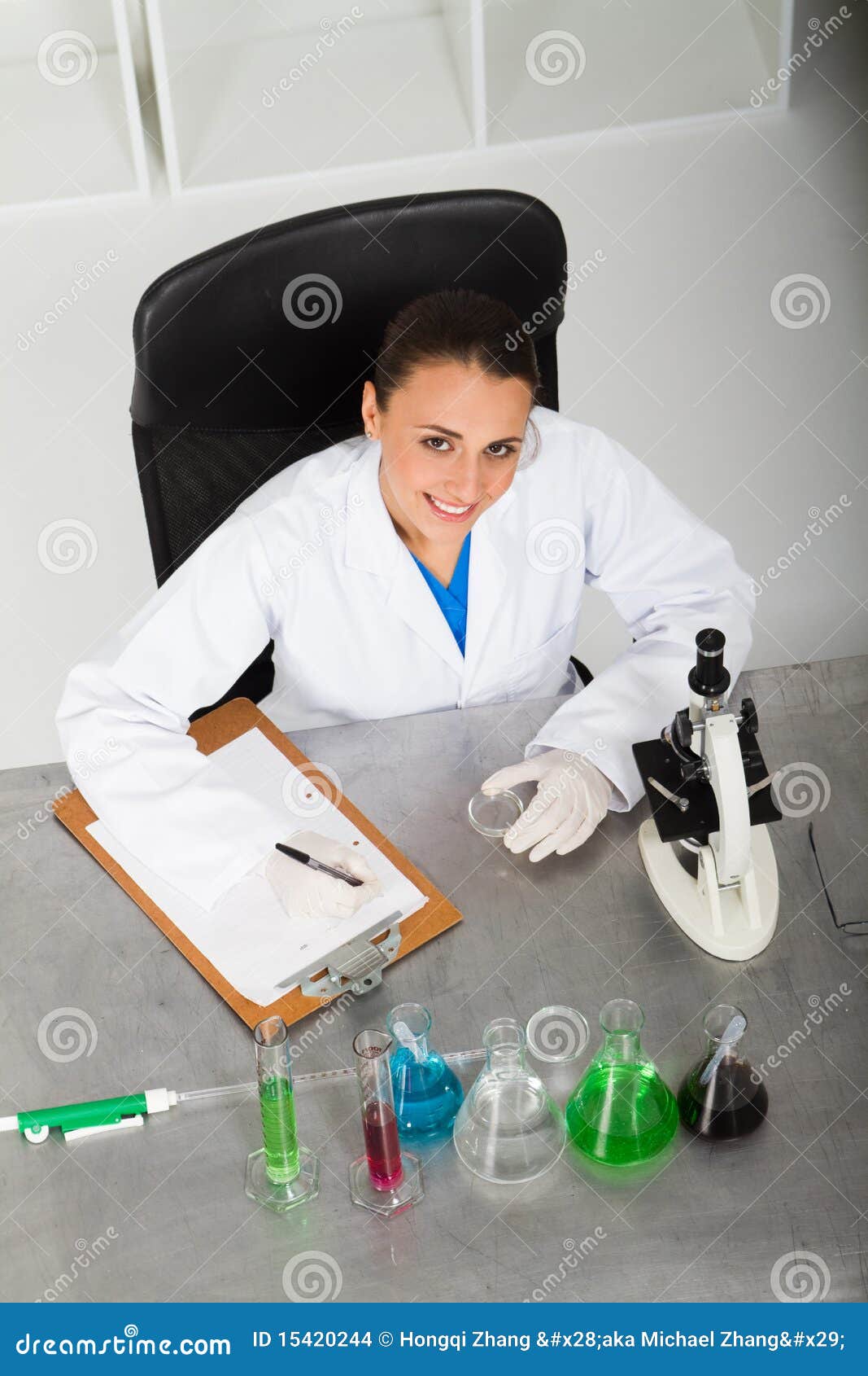 Scientist in laboratory stock photo. Image of college - 15420244