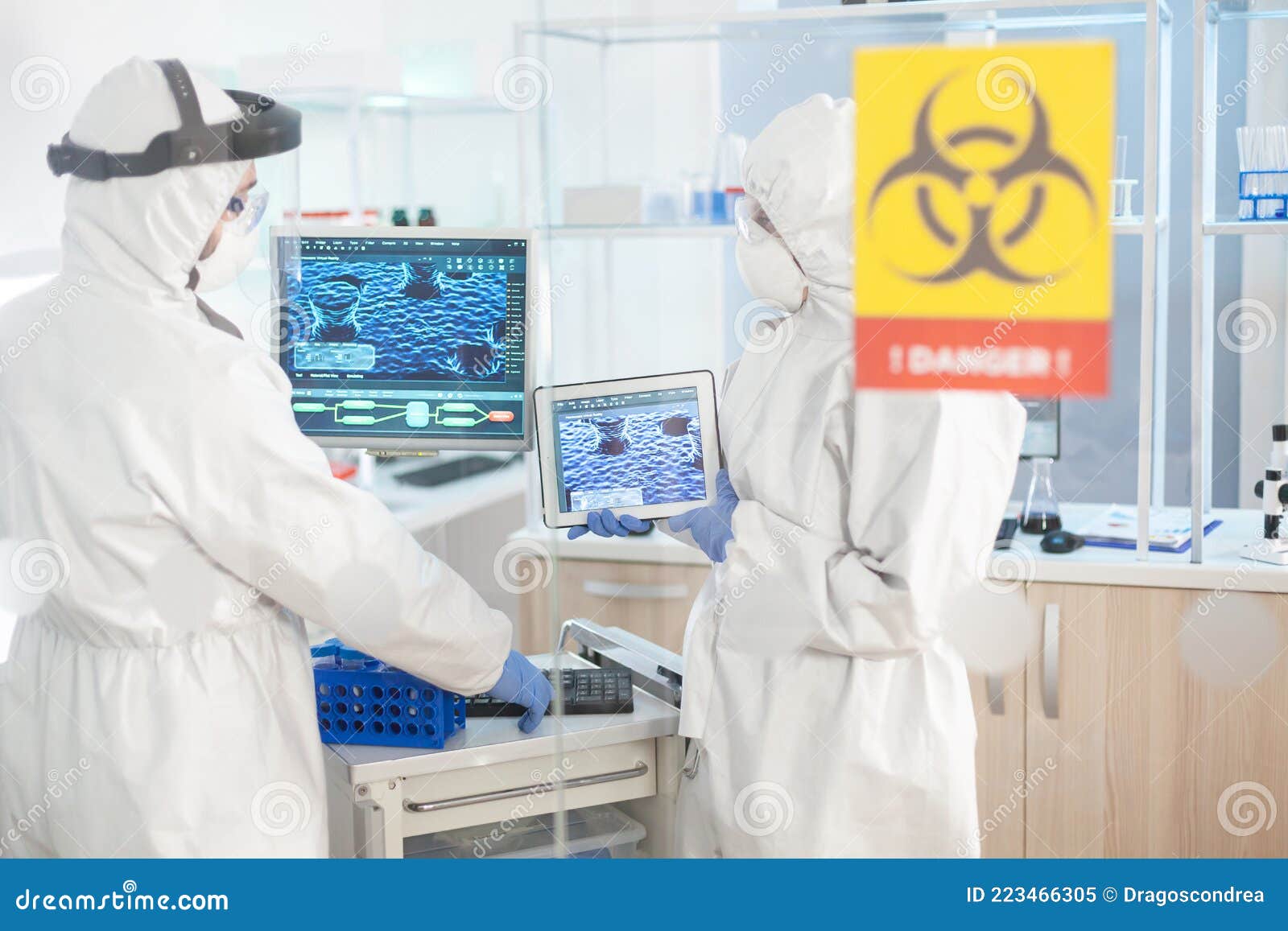 Scientist in Laboratory Danger Zone Using Tablet Pc Stock Image - Image ...