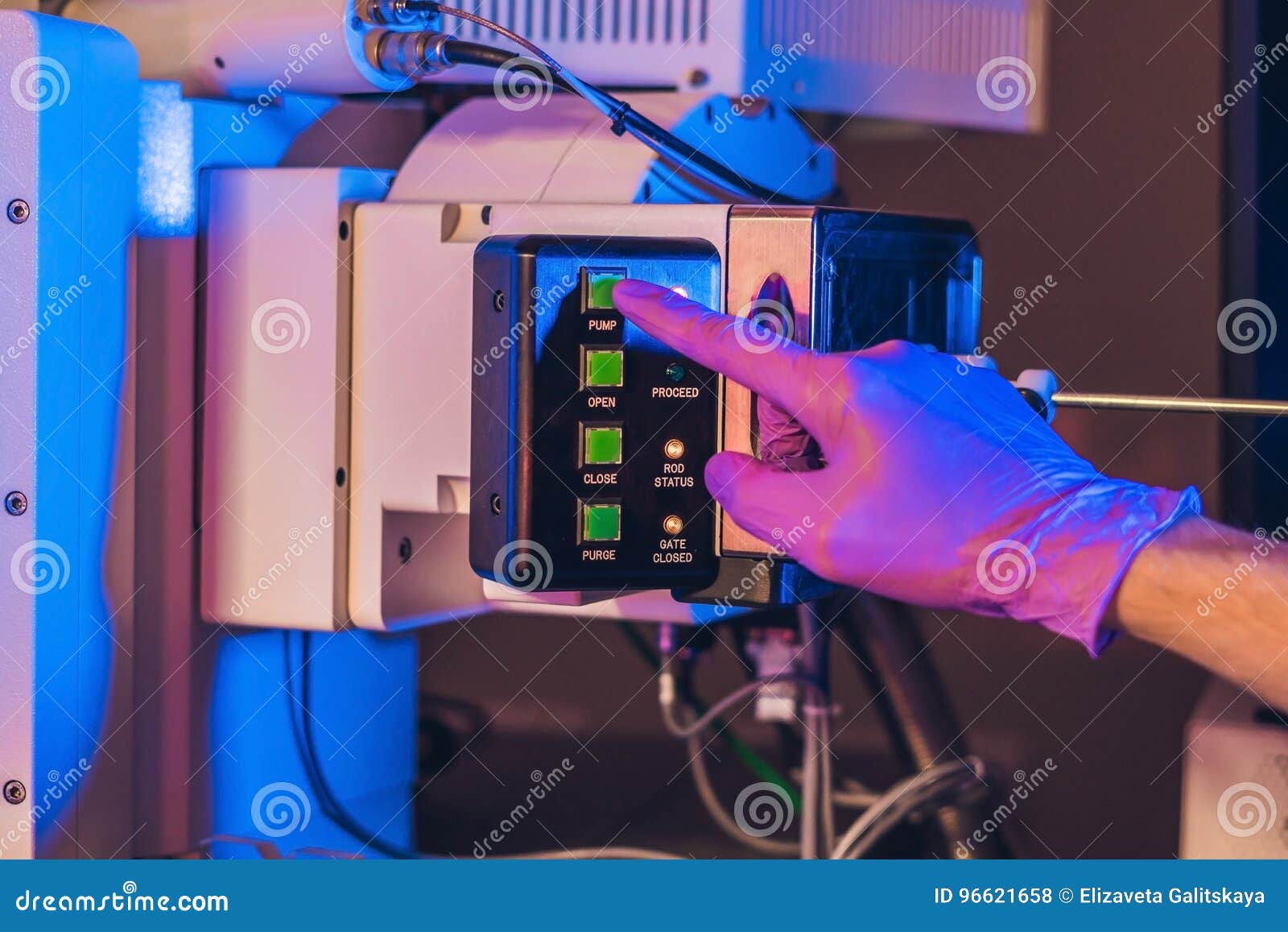 Scientist in a Laboratory Works with an Electron Microscope Gate Stock ...