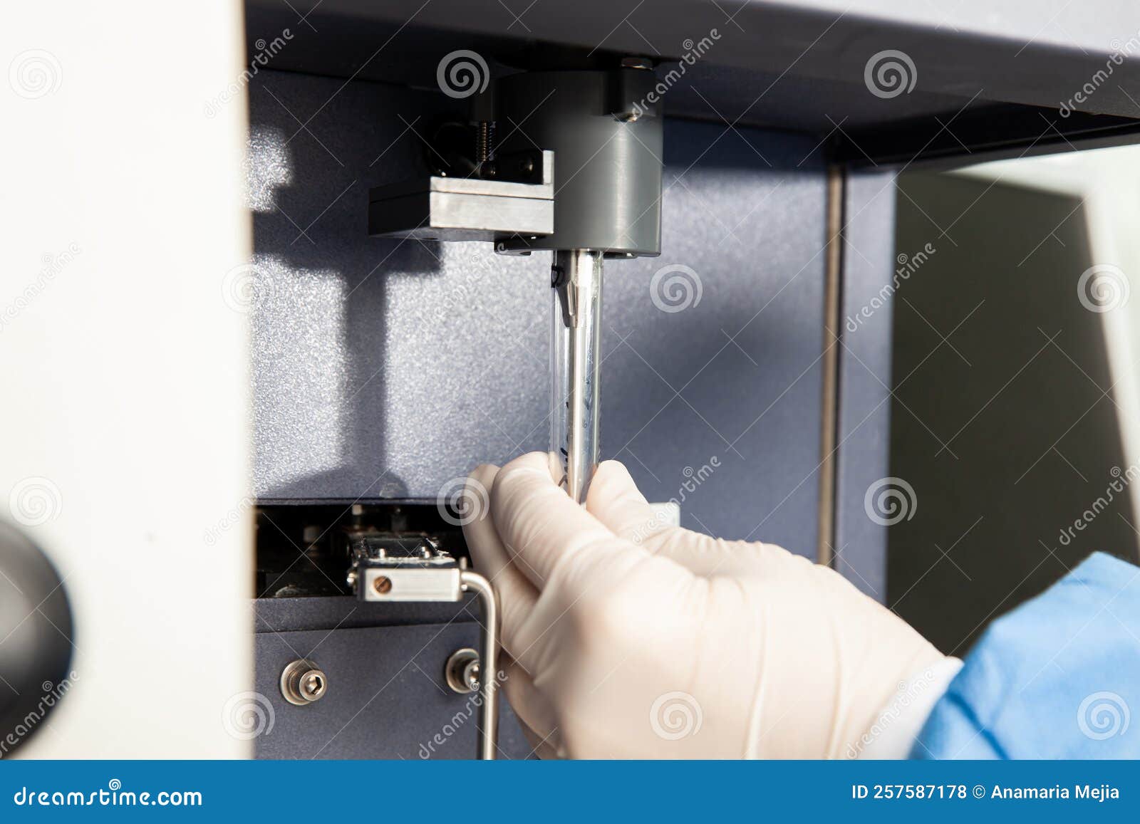 Loading A DNA Tube Into A PCR Polymerase Chain Reaction Thermocycler ...