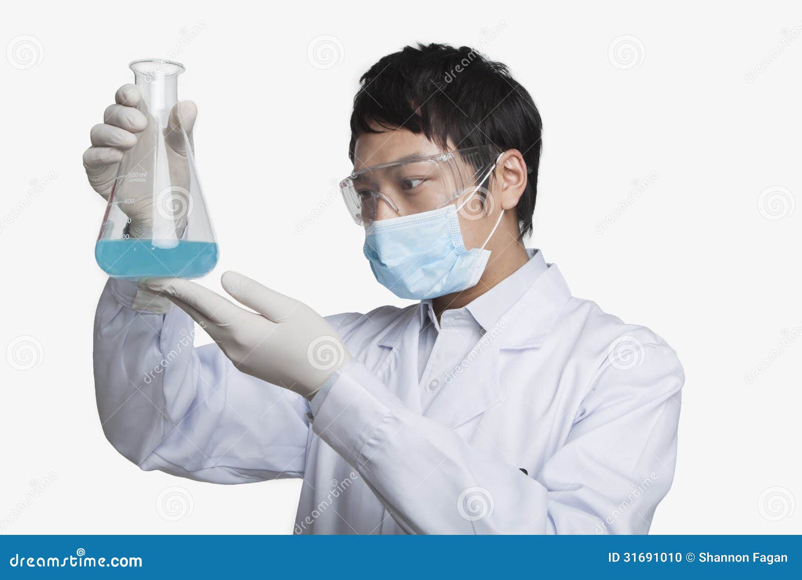 Scientist Looking at Beaker Stock Photo - Image of research, mask: 31691010