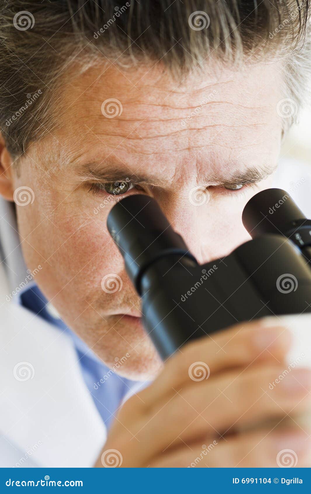 Scientist Looking through Microscope Stock Photo - Image of looking ...