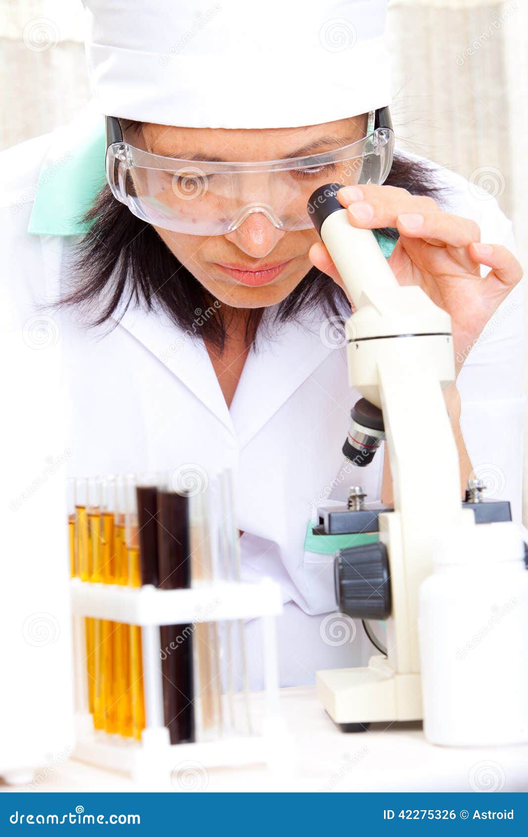 Scientist Looking into Microscope Stock Photo - Image of experiment ...