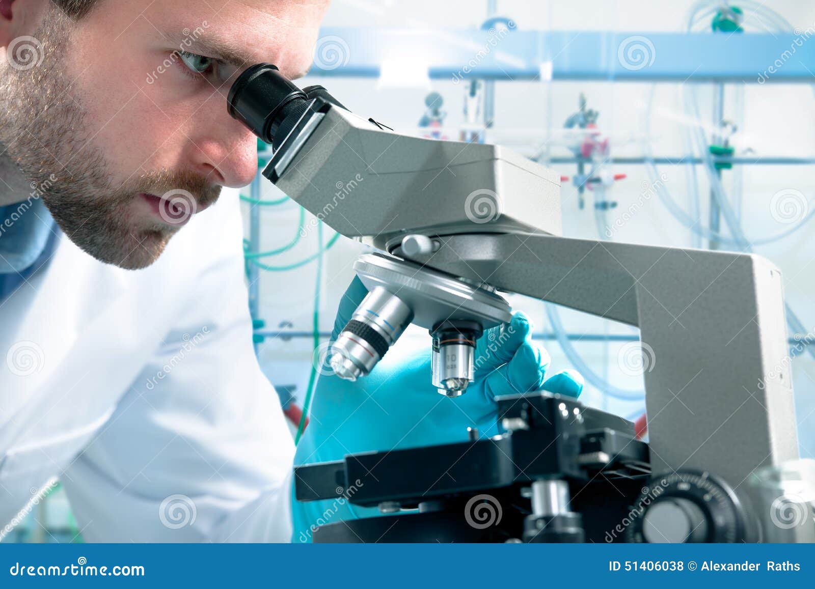 Scientist Looking through a Microscope Stock Photo - Image of medicine ...