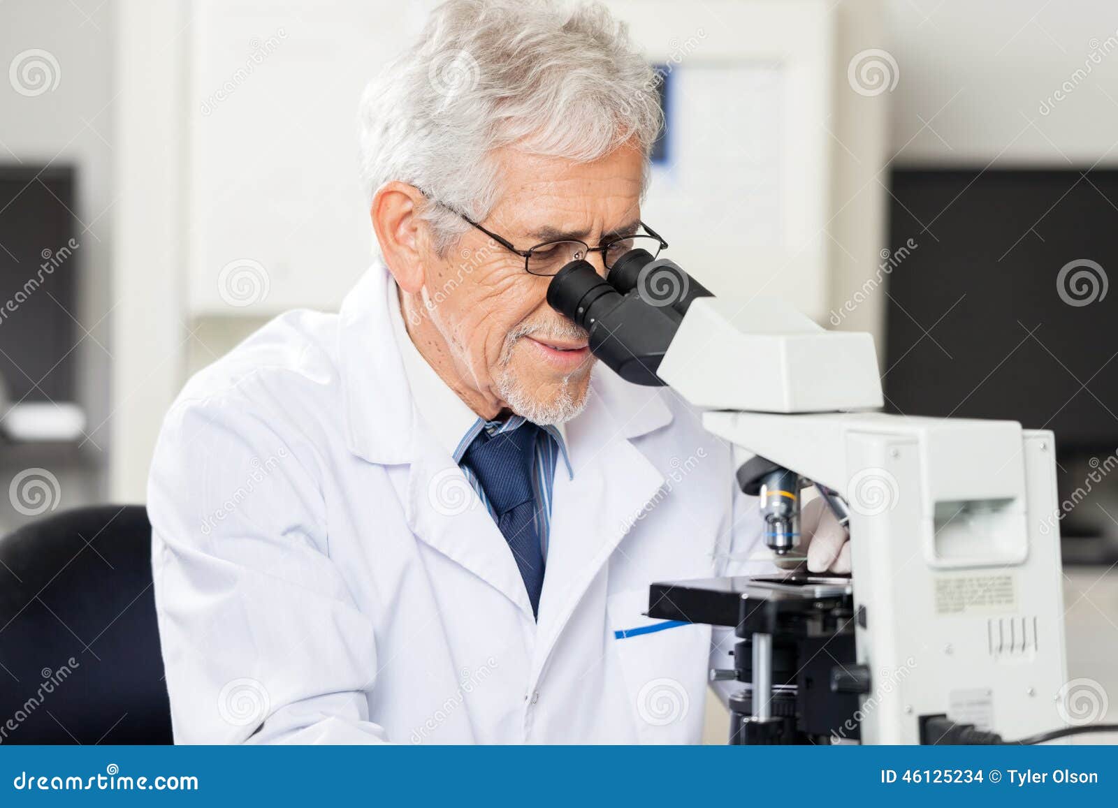 Scientist Looking into Microscope in Laboratory Stock Photo - Image of ...