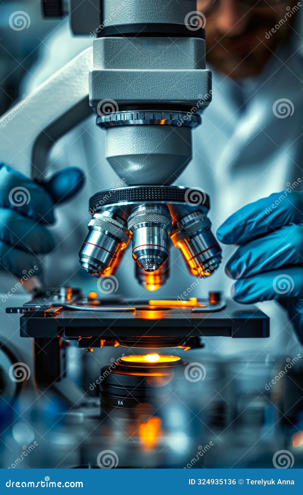 A Scientist is Looking through a Microscope at a Sample. Concept of ...