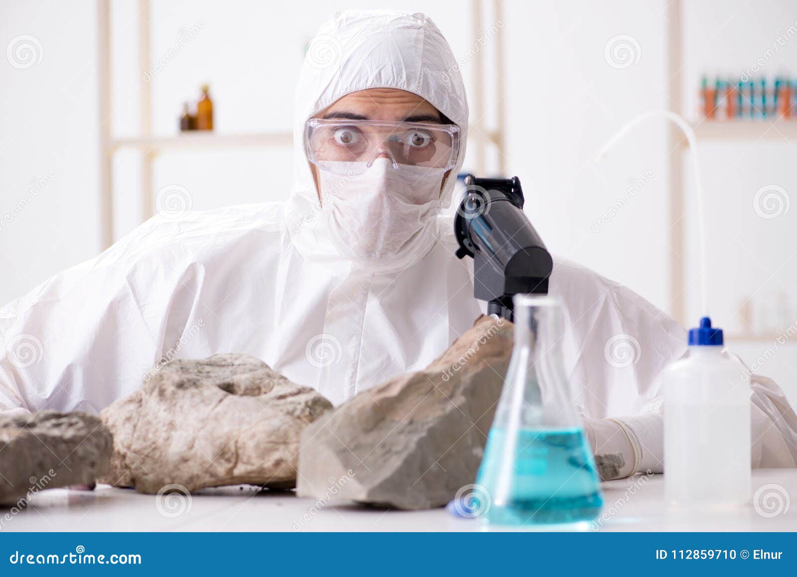 The Scientist Looking and Stone Samples in Lab Stock Photo - Image of ...