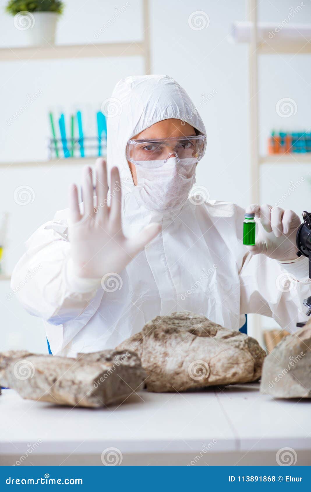 The Scientist Looking and Stone Samples in Lab Stock Photo - Image of ...