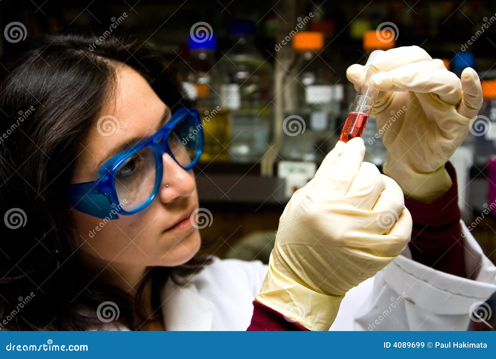 Scientist Looking at Test Tube Stock Image - Image of test, molecule ...