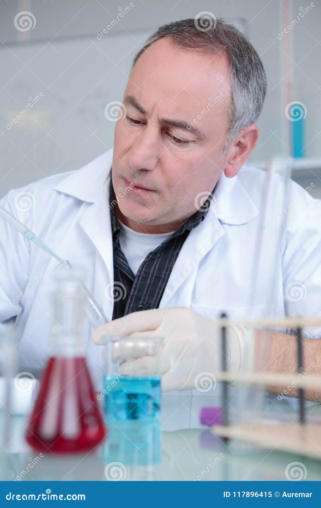 Scientist Looking at Test-tube Stock Image - Image of liquid ...