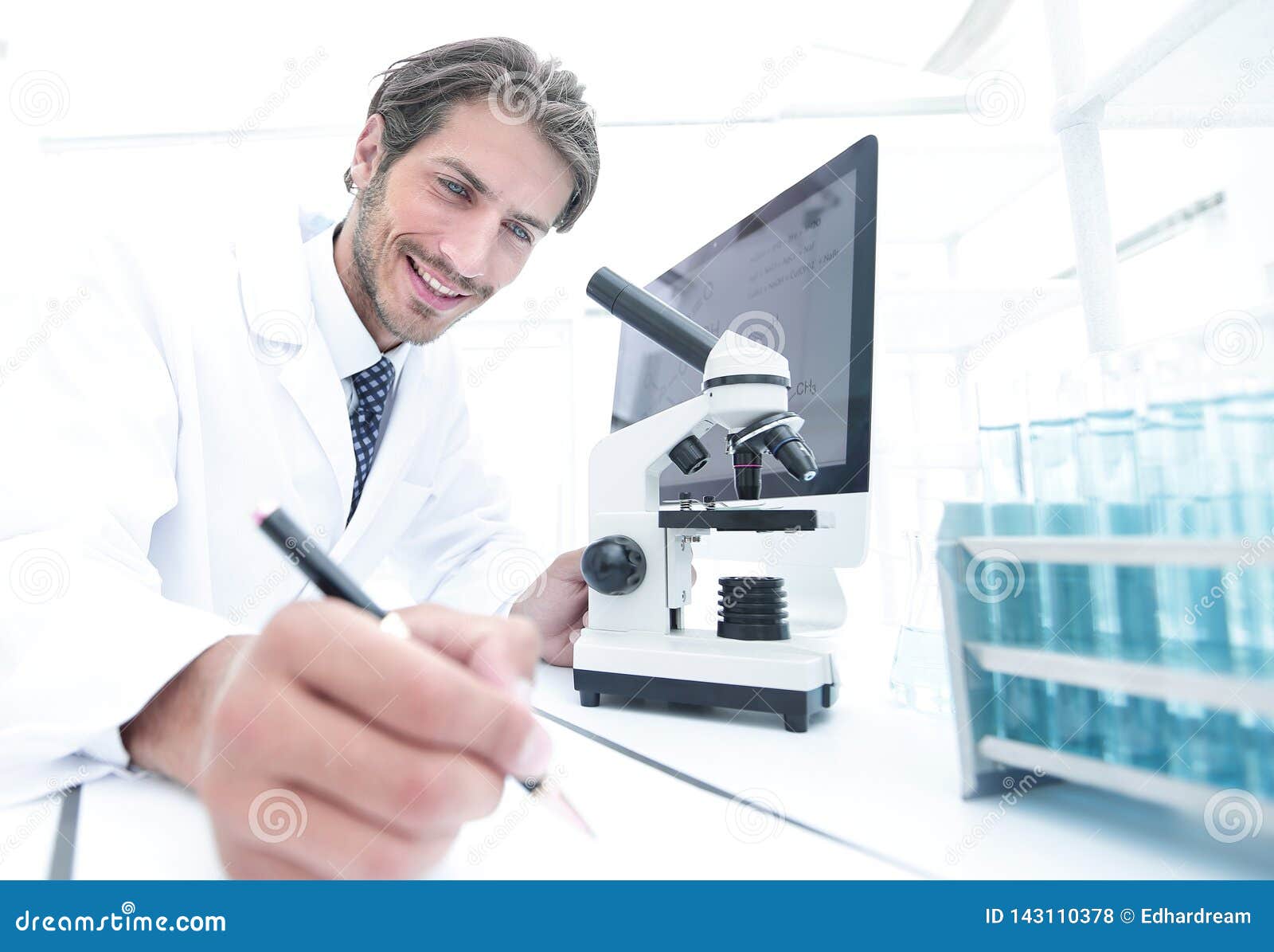 Scientist Makes a Note of Experiment in the Laboratory Stock Photo ...