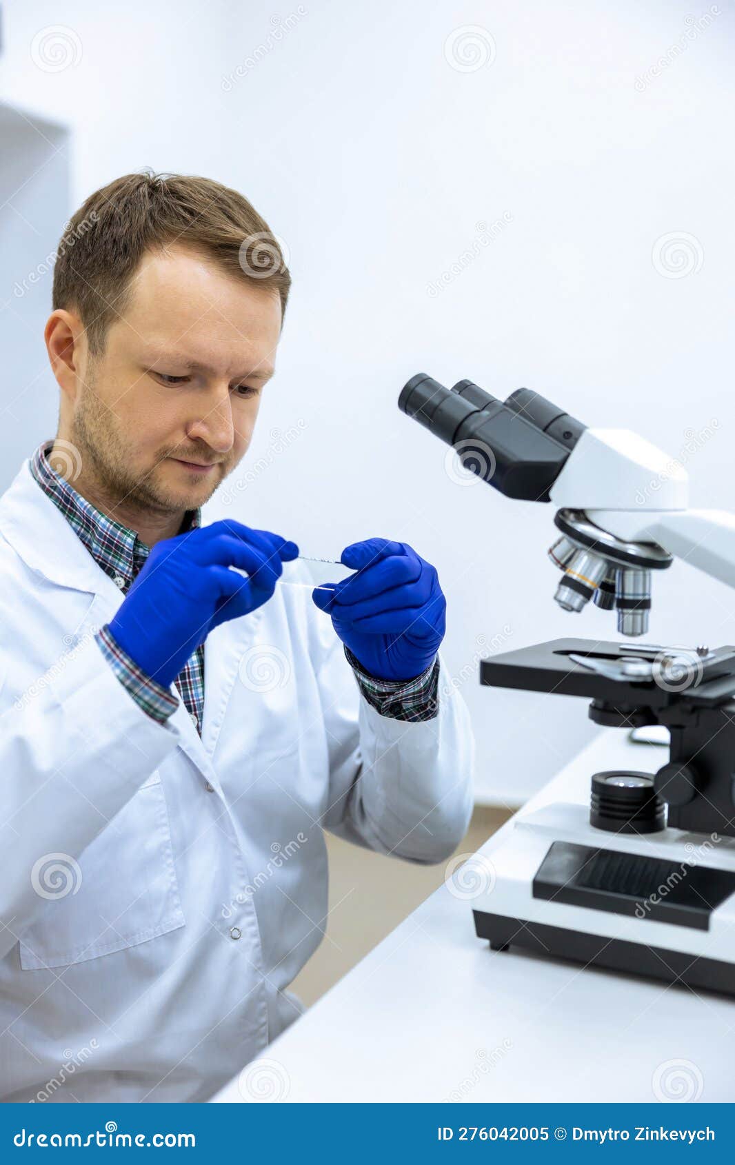 Scientist Man Doing Chemical Experiment, Making Analyzing, Looking at ...