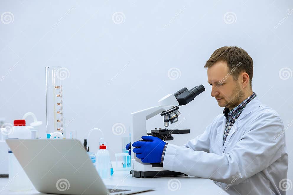 Scientist Man Doing Chemical Experiment, Making Analyzing, Looking ...
