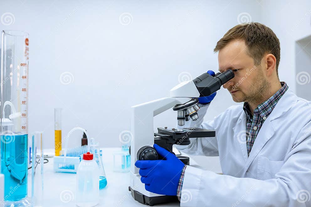 Scientist Man Doing Chemical Experiment, Making Analyzing, Looking ...