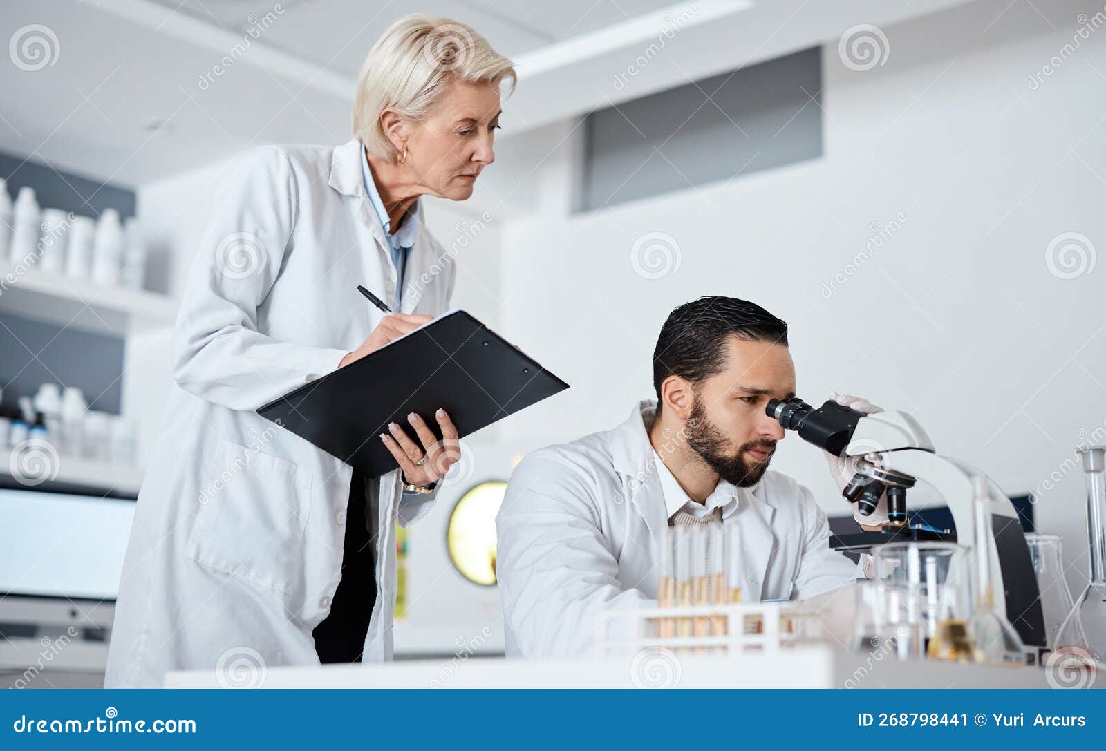 Scientist Man, Woman and Microscope with Checklist in Laboratory for ...