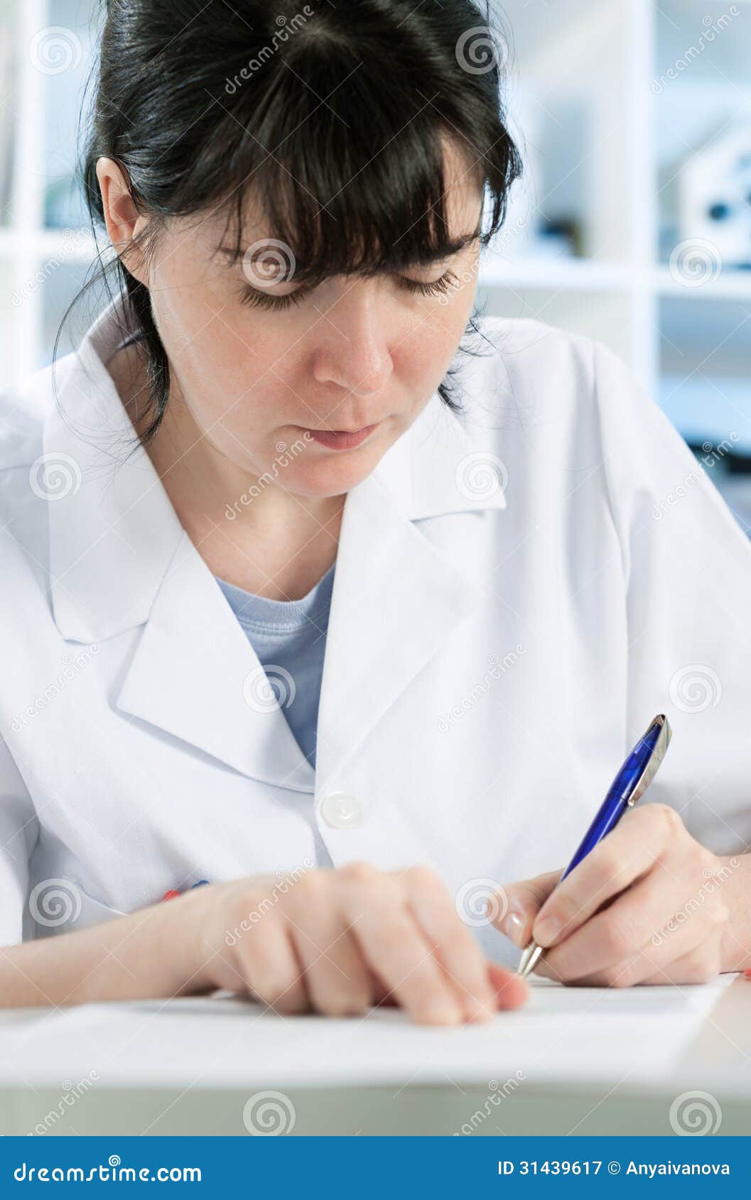 Scientist or a Medical Student Writing Stock Image - Image of serious ...