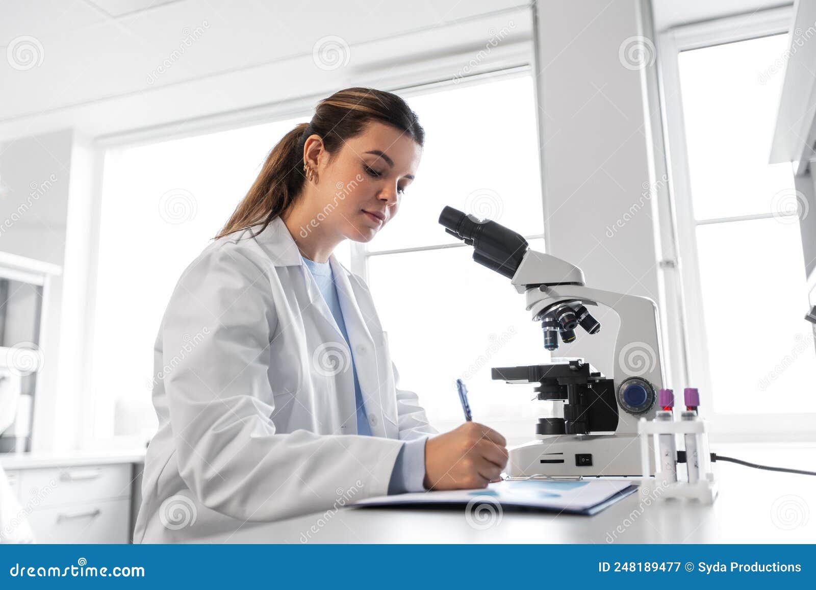 Scientist with Microscope Working in Laboratory Stock Image - Image of ...