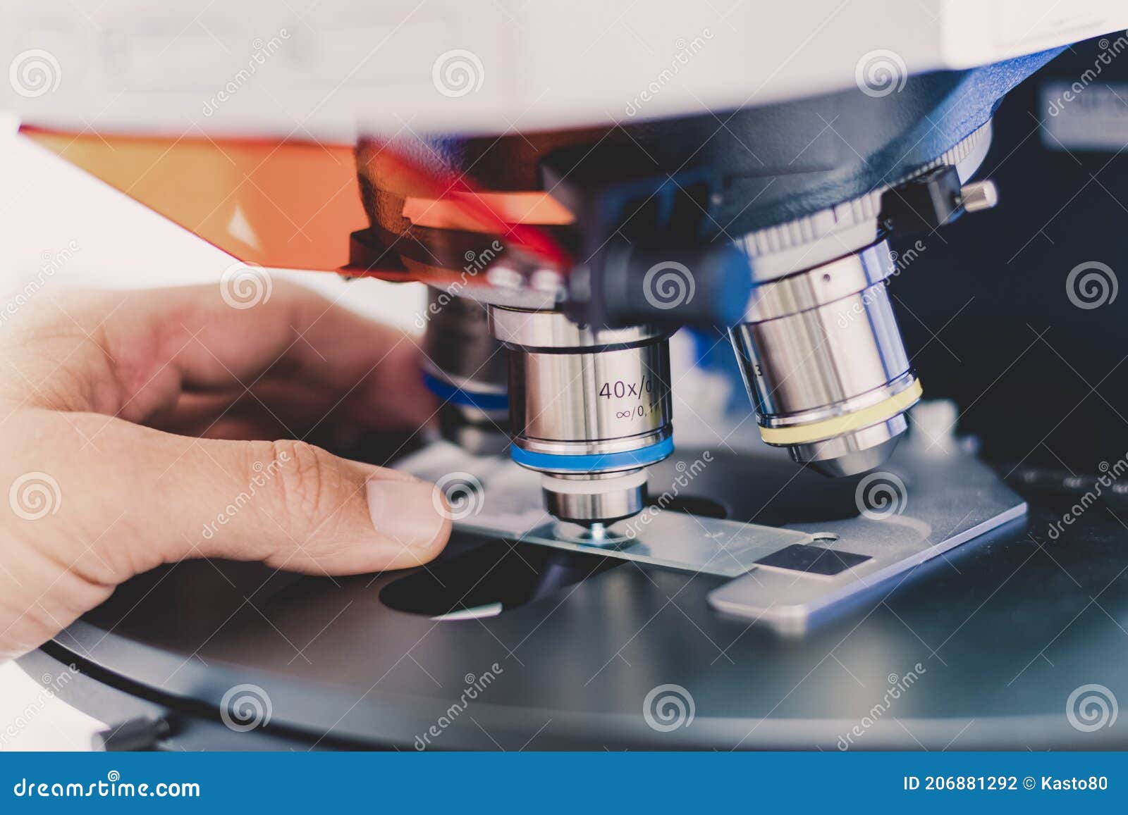 Scientist Microscoping on Fluorescent Microscope. Stock Photo - Image ...