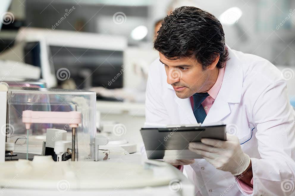 Scientist Observing Experiment Stock Photo - Image of examination ...