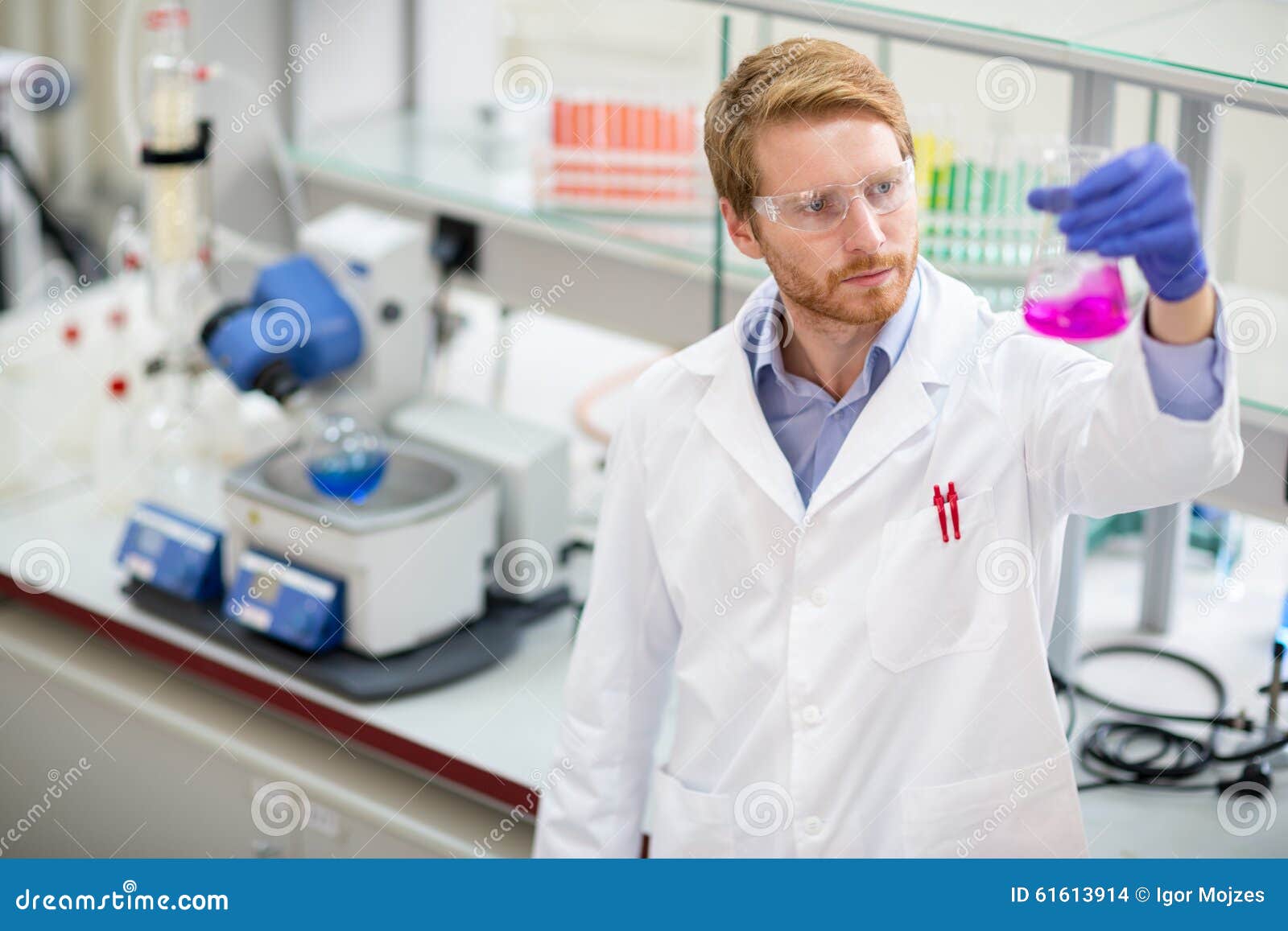 Scientist Observing Liquid Reagent Stock Photo - Image of examining ...