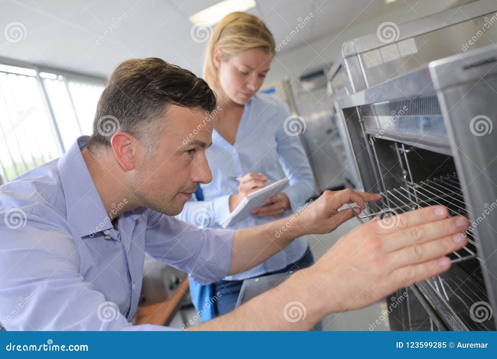 Scientist Opening High Tech Oven Stock Image - Image of grab, silver ...