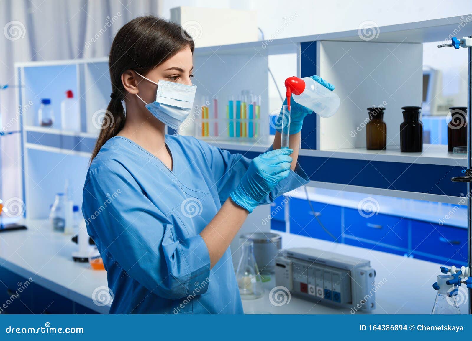 Scientist Pouring Liquid into Test Tube. Laboratory Analysis Stock ... Scientist Pouring Liquid into Test Tube. Laboratory Analysis Stock ...