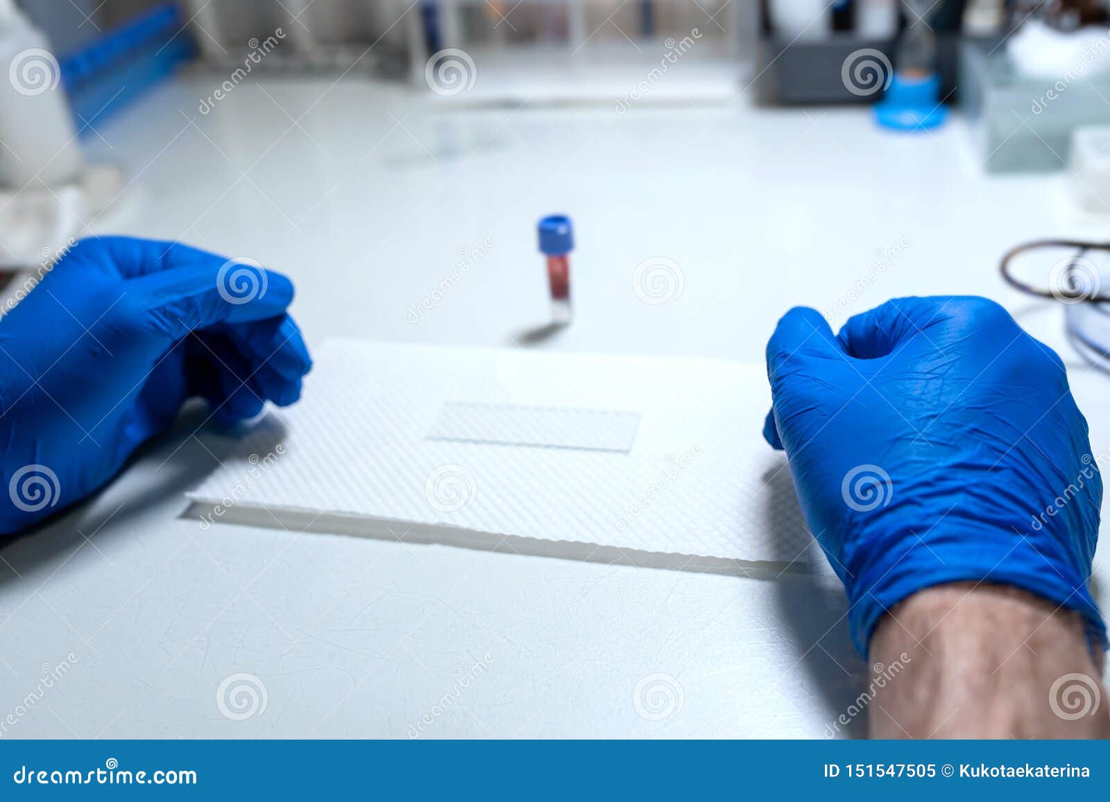Scientist Prepare Blood Sample for Research on Microscope. Placing ...