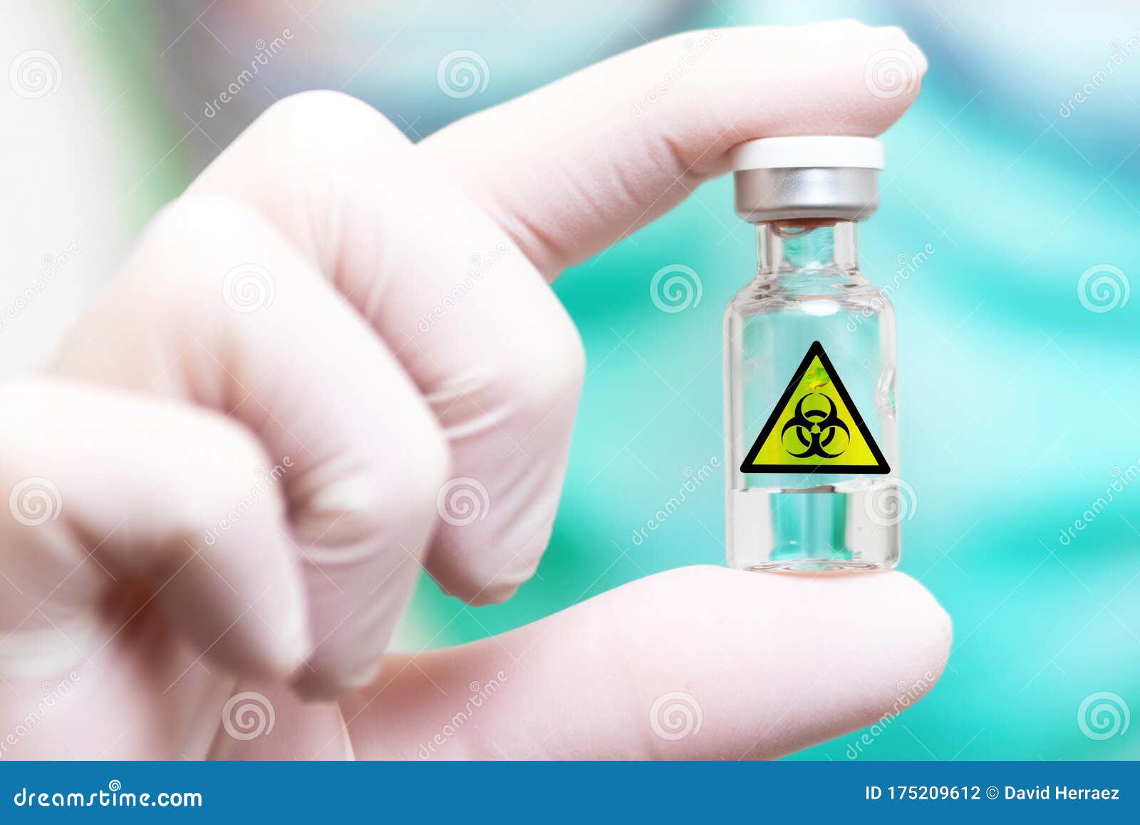 Scientist in Protective Mask Holding Sample Tube with Biohazard Sign ...