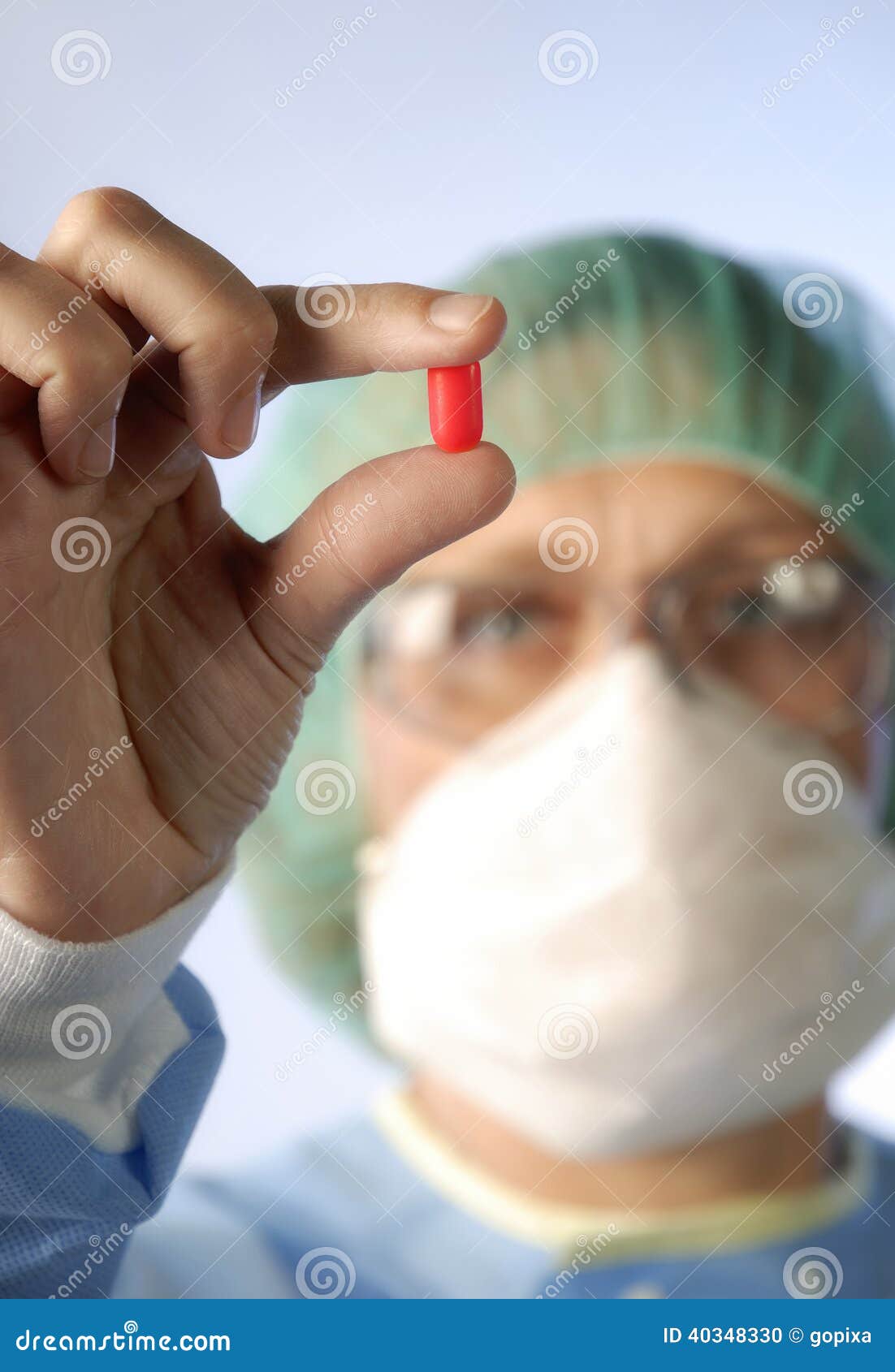 Scientist with red pill stock photo. Image of medical - 40348330