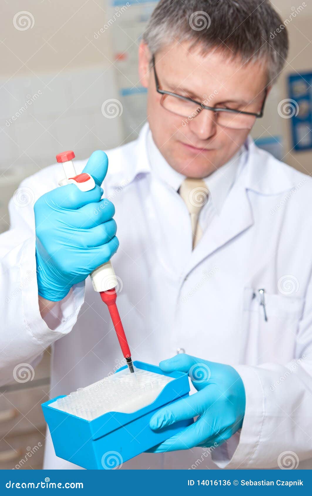 Scientist running a test stock photo. Image of working - 14016136