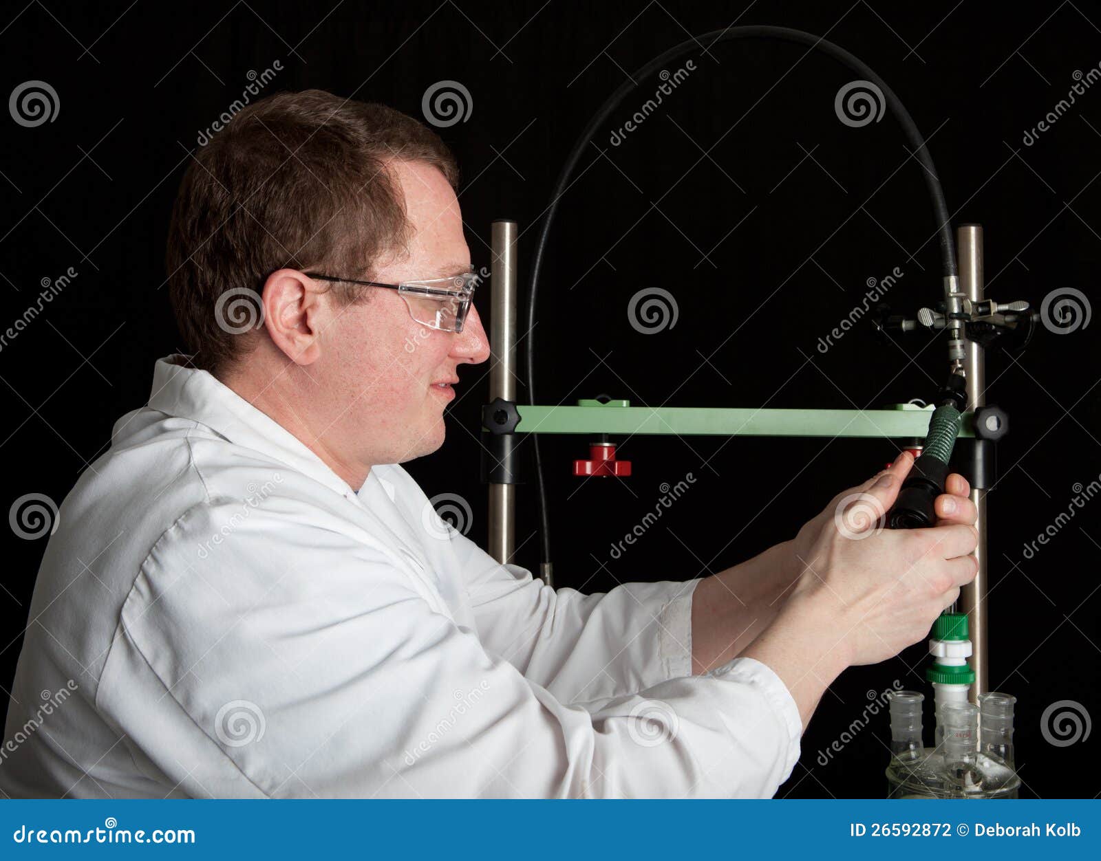 Scientist Setting Up Equipment Stock Photo - Image of black, scientist ...