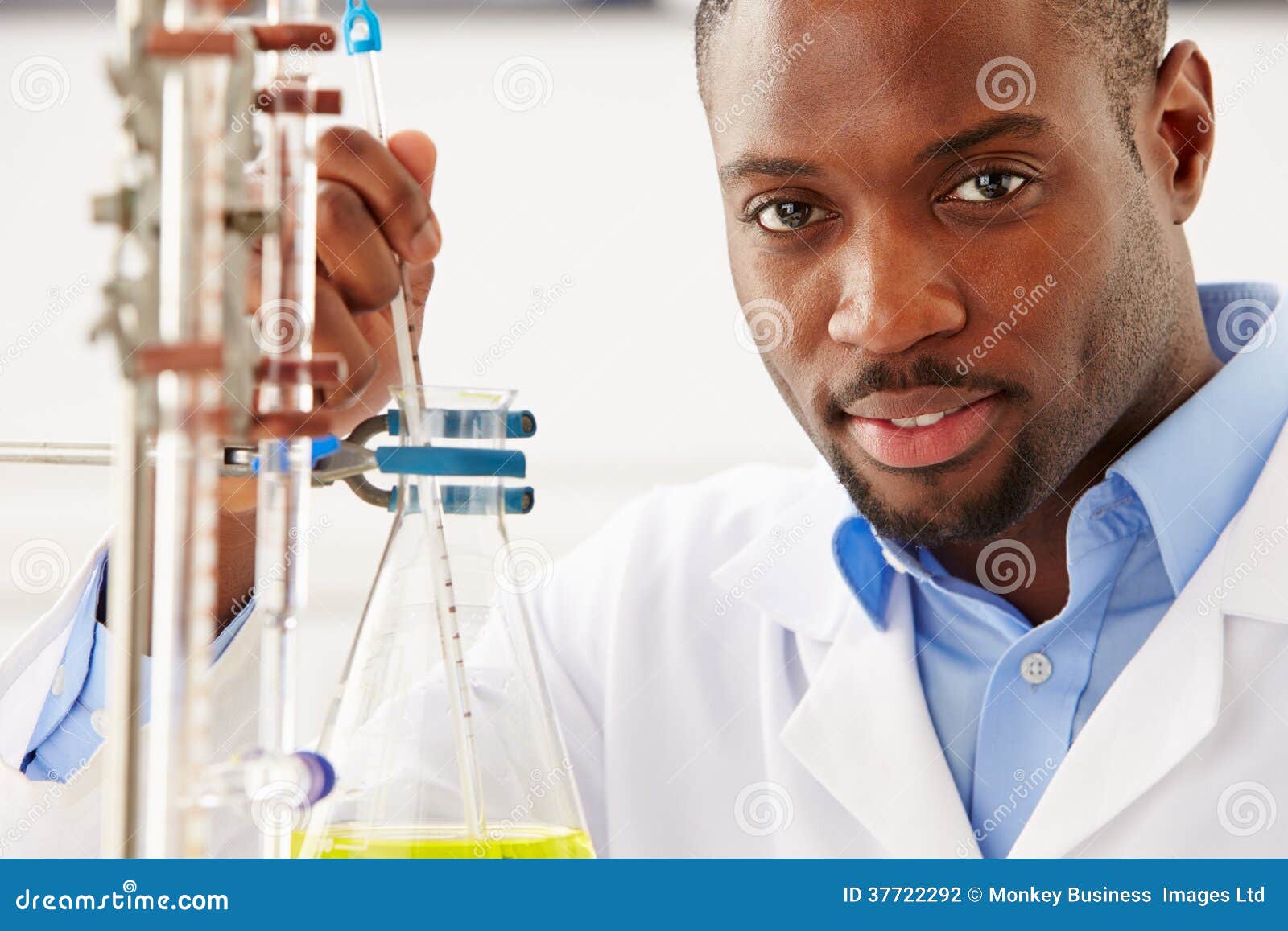 Scientist Studying Liquid in Flask Stock Photo - Image of glass ...