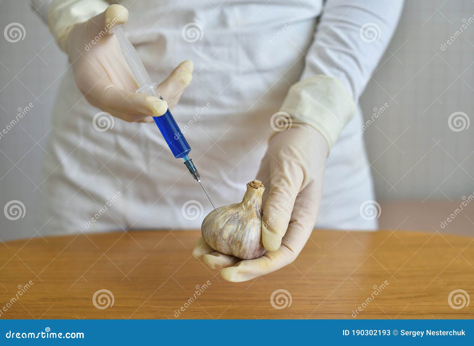 Scientist with Syringe and Garlic Stock Image - Image of injection ...