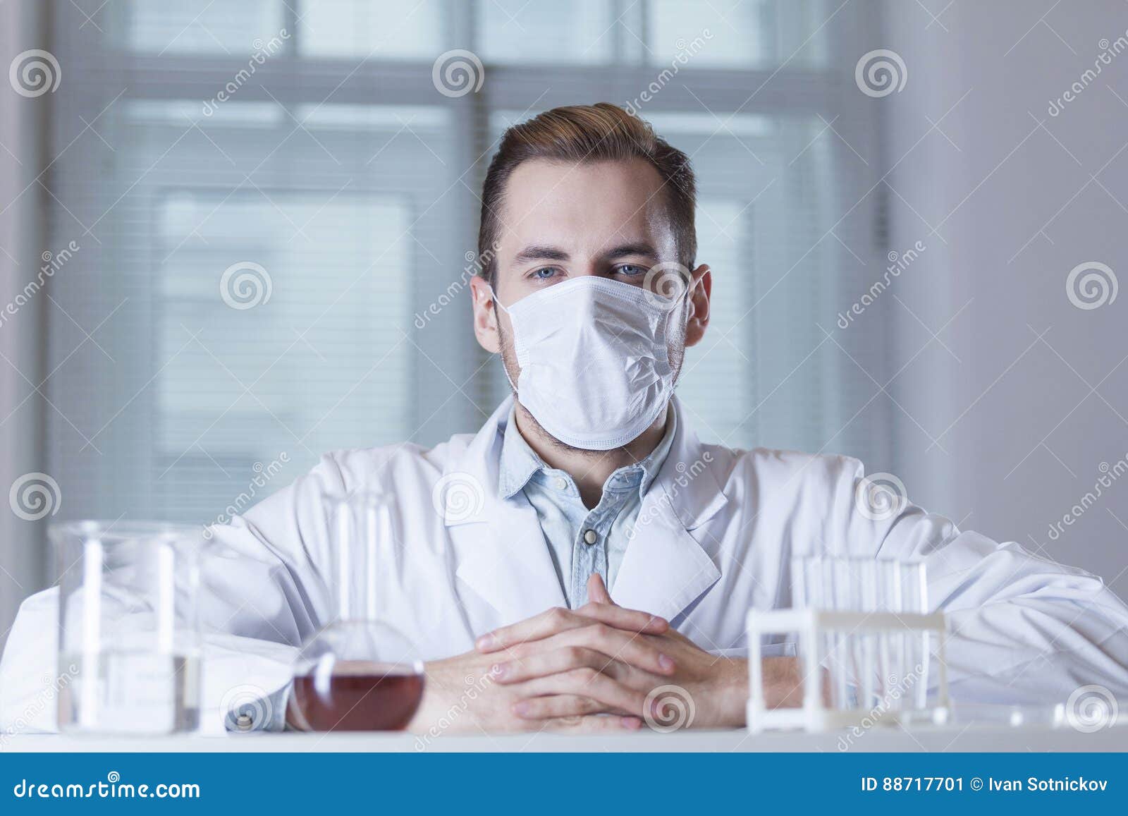 Scientist at the table stock image. Image of beaker, white - 88717701