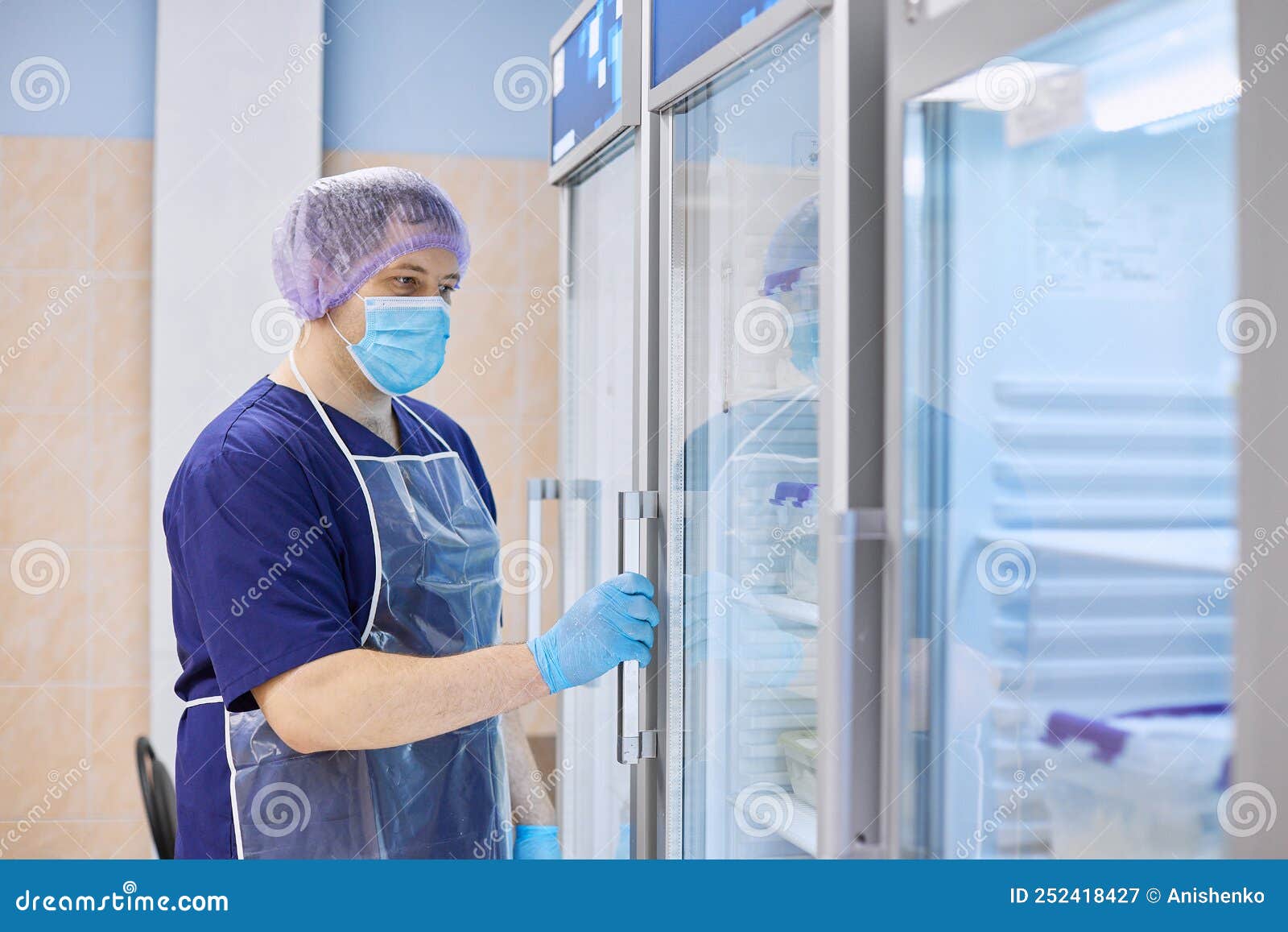 The Scientist Takes Samples of Materials for Experiments Out of the ...