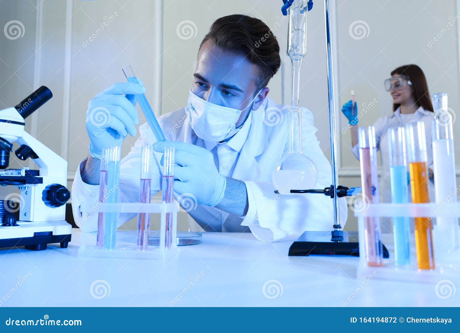 Scientist Taking Test Tube from Rack. Laboratory Analysis Stock Photo ...
