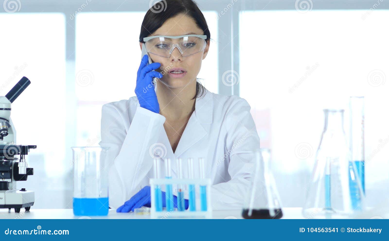 Scientist Talking on Phone in Laboratory Stock Image - Image of call ...