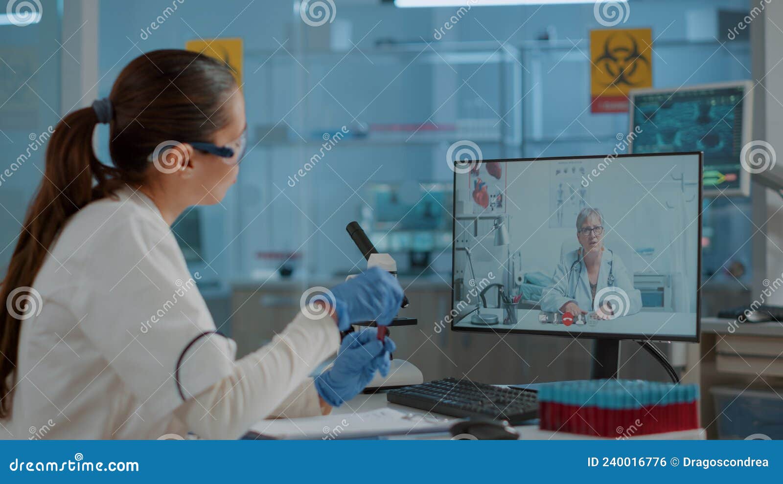 Scientist Talking To Expert on Video Call Conference in Laboratory ...