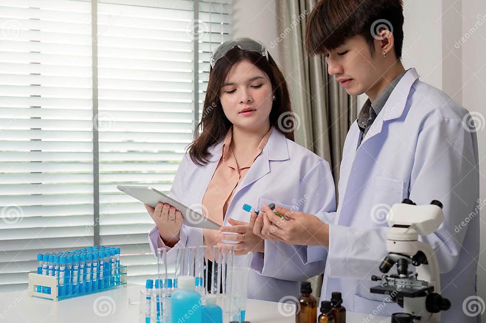 Scientist Team Analyzing Lab Samples for Innovative Solutions Stock Photo - Image of progress ...