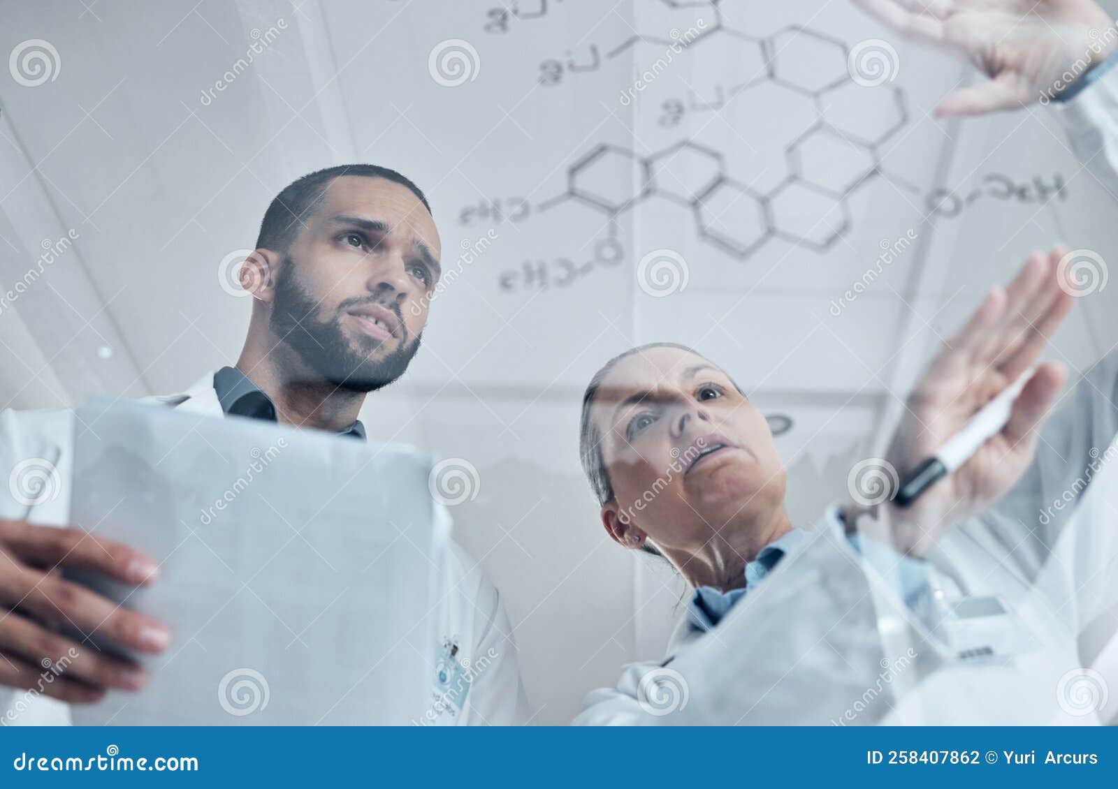 Scientist Team, Science and Chemistry Formula on Glass Board while ...