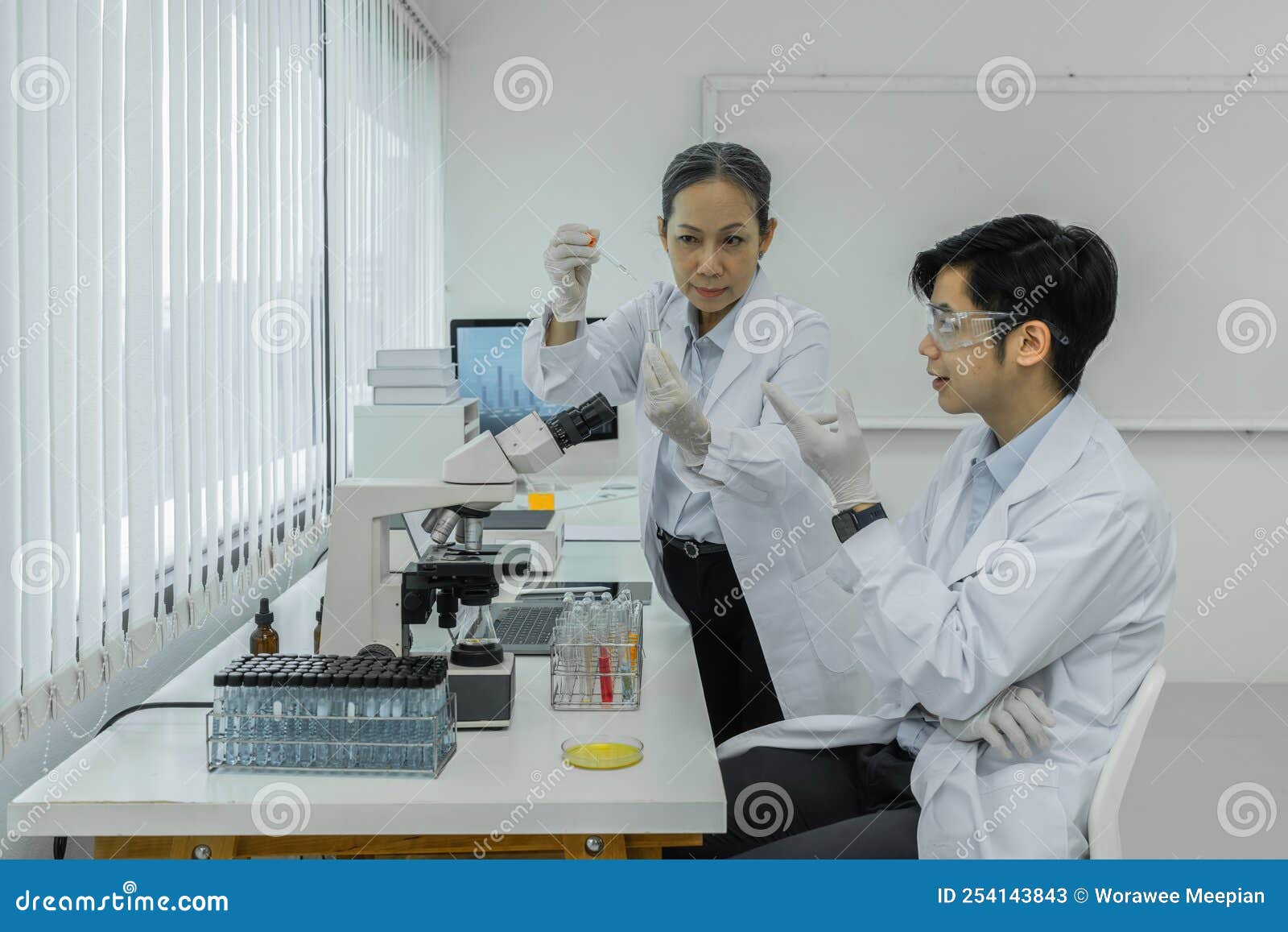 Scientist with a Test Tube Containing Cannabis Extract Stock Image ...