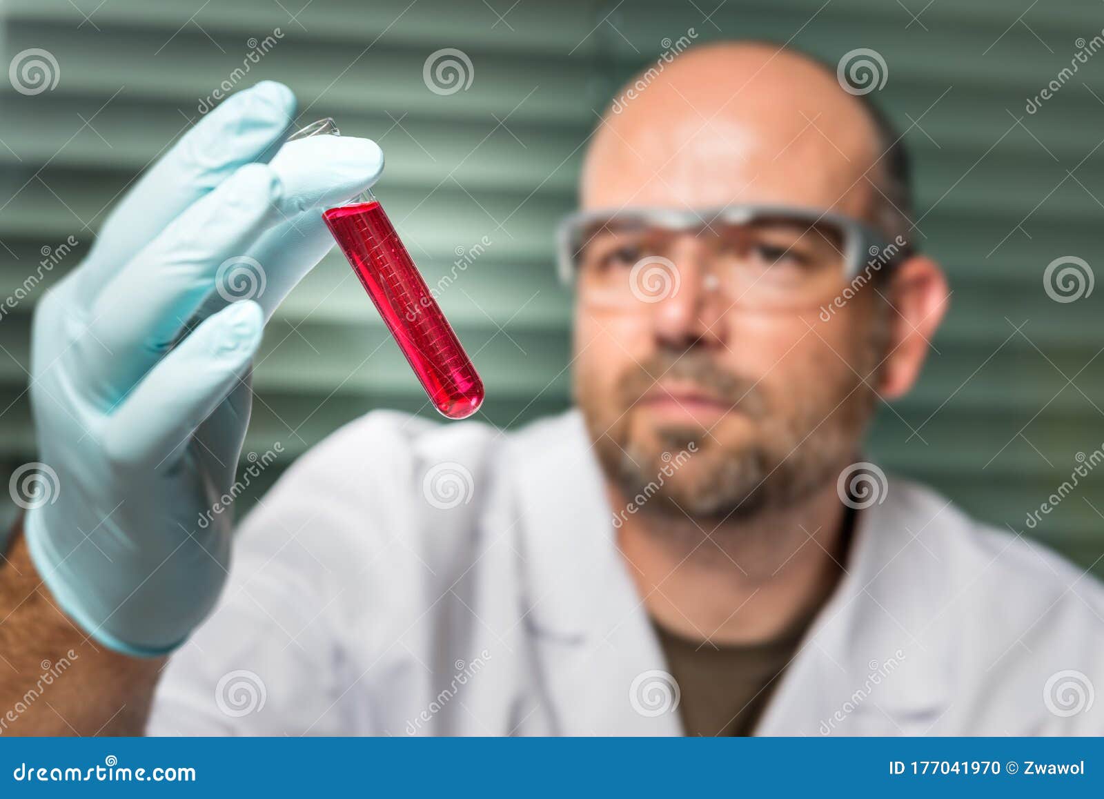 Scientist with a Test Tube and Red Liquid Stock Photo - Image of virus ...