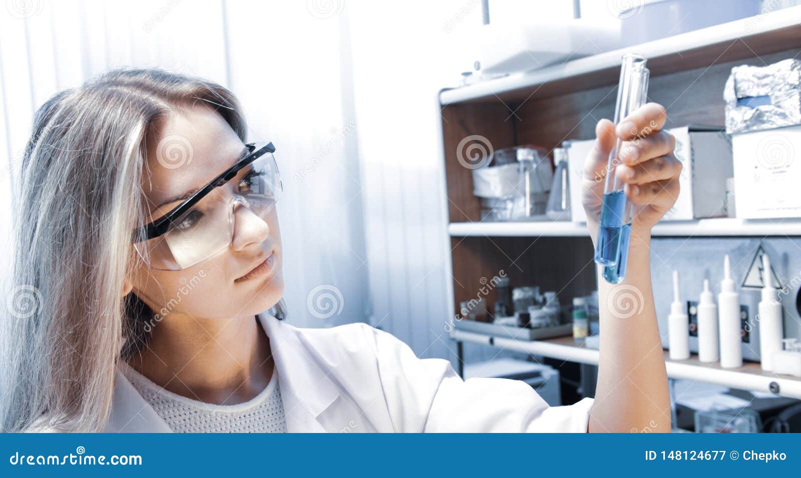 Scientist with test tubes stock image. Image of chemist - 148124677