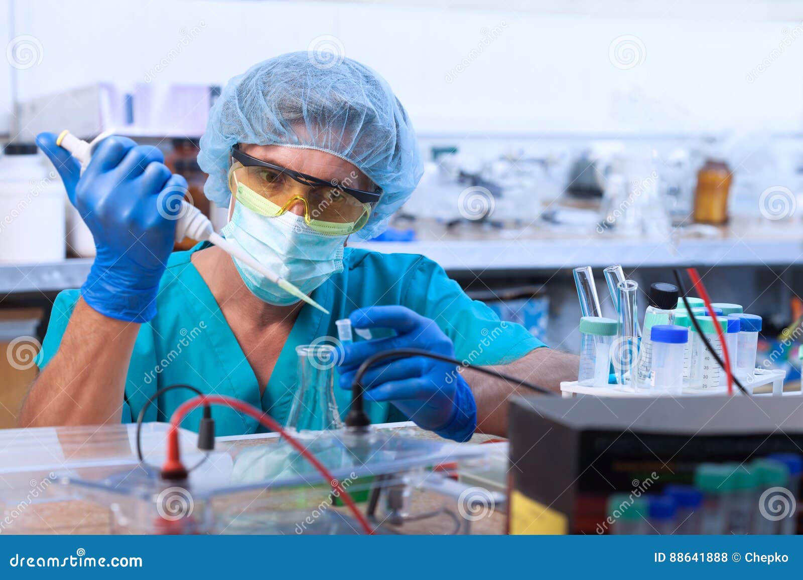 Scientist with test tubes stock photo. Image of experiment - 88641888