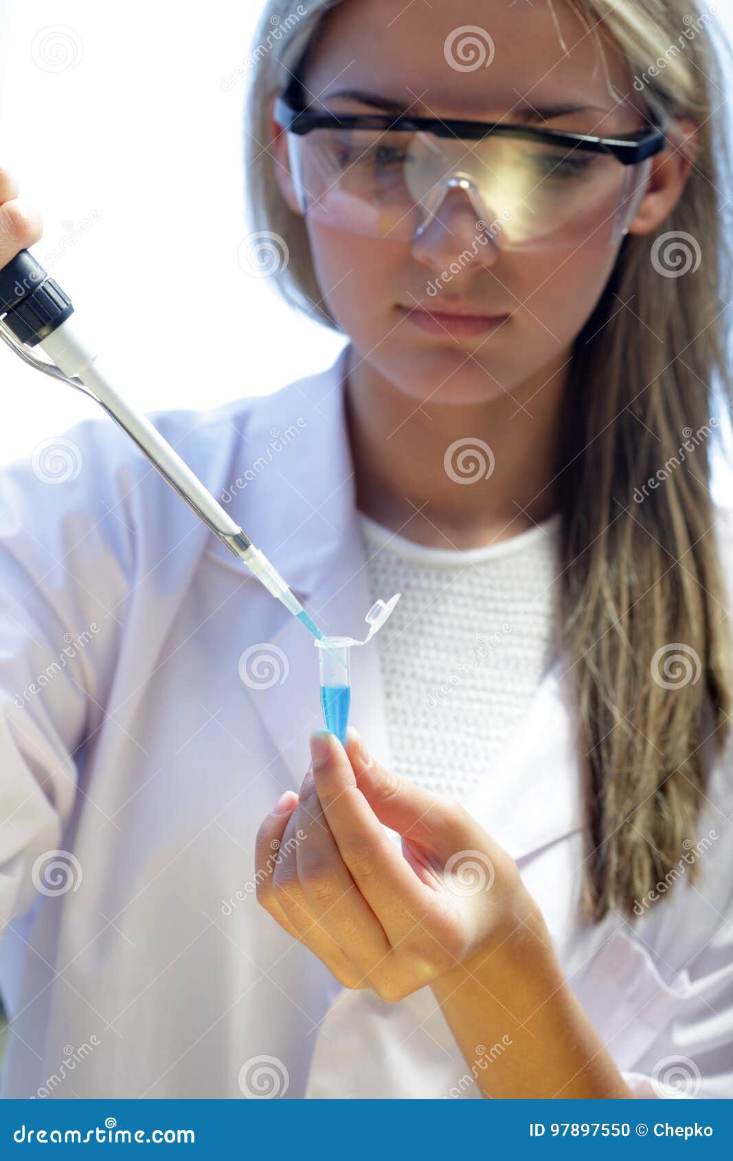 Scientist with test tubes stock photo. Image of glasses - 97897550