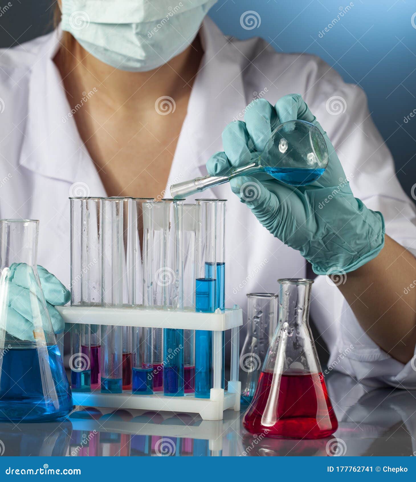 Scientist with test tubes stock image. Image of blue - 177762741