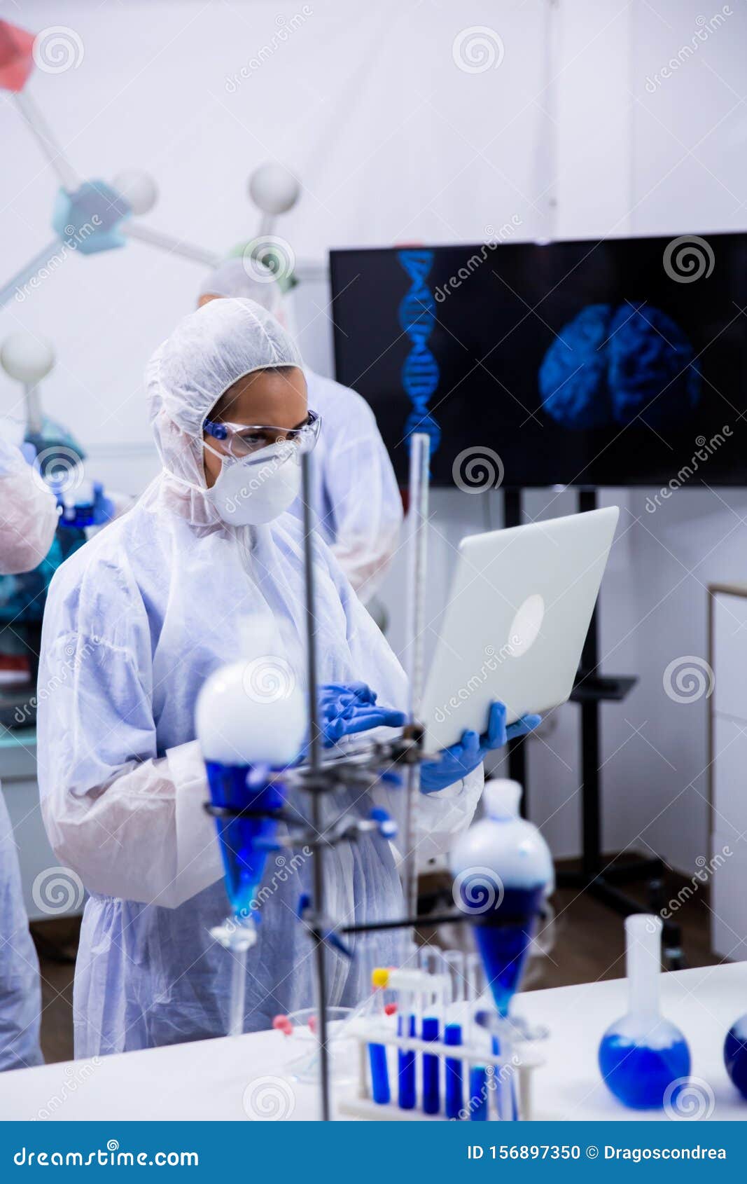 Scientist Typing on Her Computer Data from Exeperiments Stock Photo ...