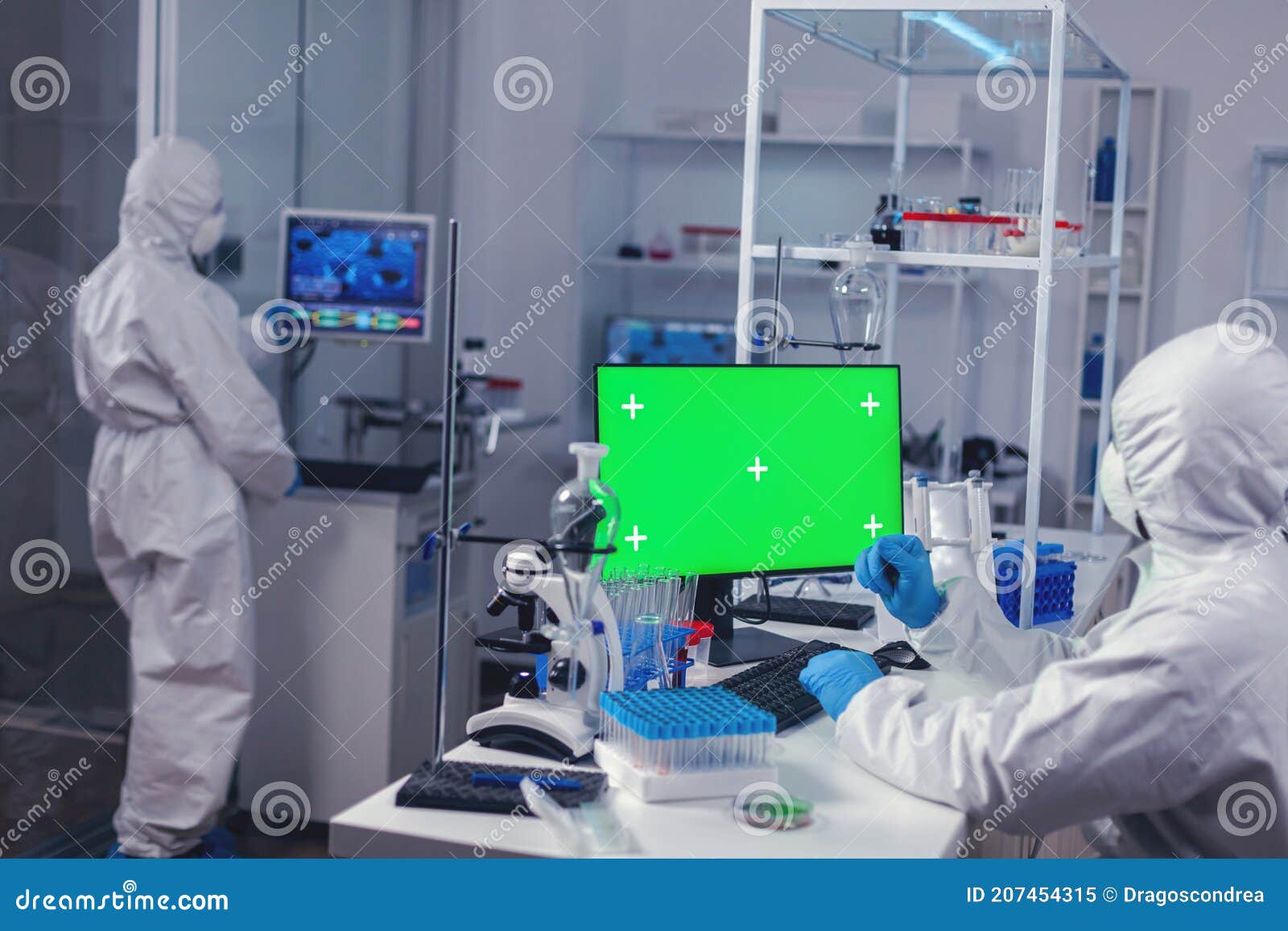 Scientist Typing on Keyboard Works with Computer with Green Screen ...