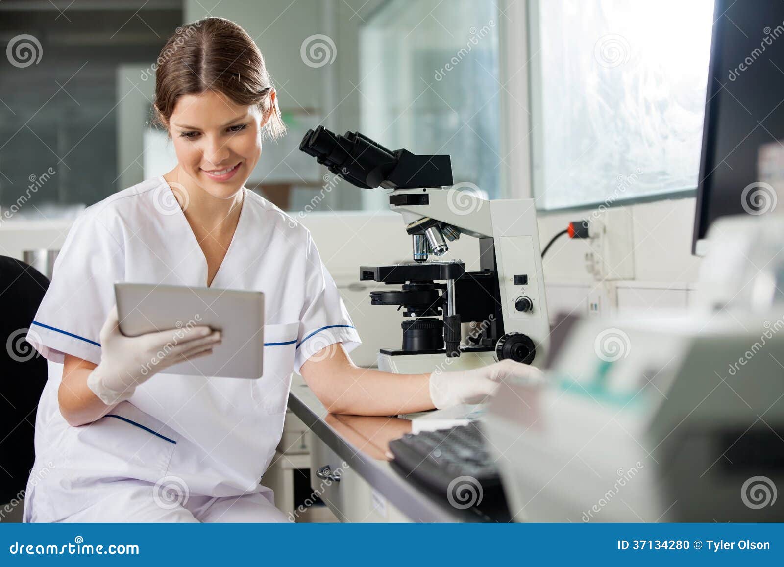 Scientist Using Digital Tablet in Lab Stock Photo - Image of digital ... Scientist Using Digital Tablet in Lab Stock Photo - Image of digital ...